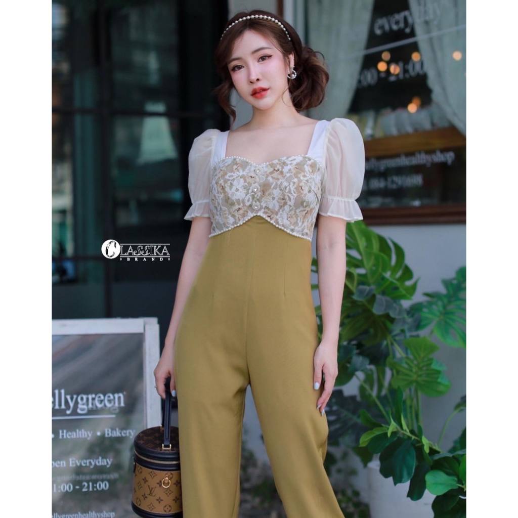 The Long-Sleeved Jumpsuit Decorated With Heart-Shaped Lace. Lime Green ...