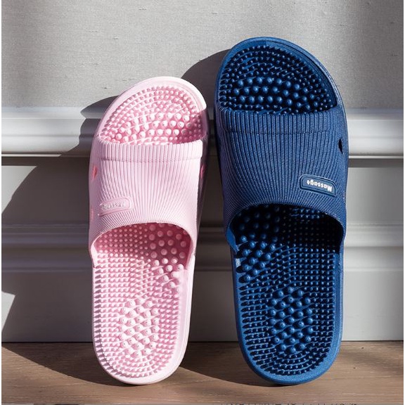 Double foot massage slippers made of solid plastic with soft spikes for ...