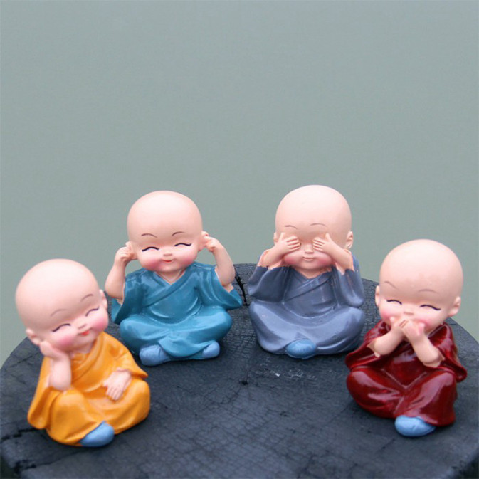 Set of four empty statues with many funny colors (including 4 little ...
