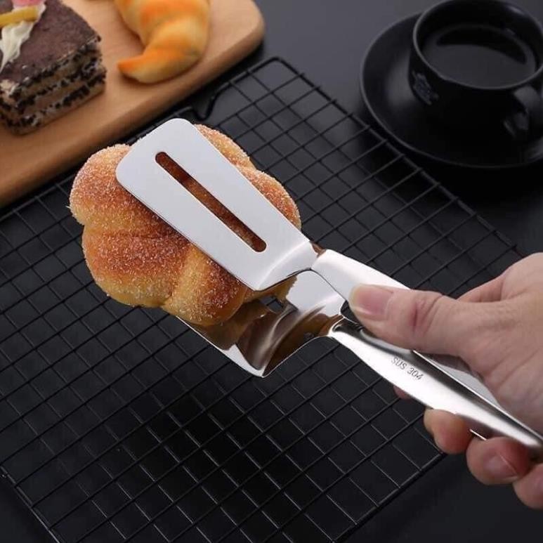 Multi-purpose kitchen utensils, tongs to pick up hot foods such asCNY ...