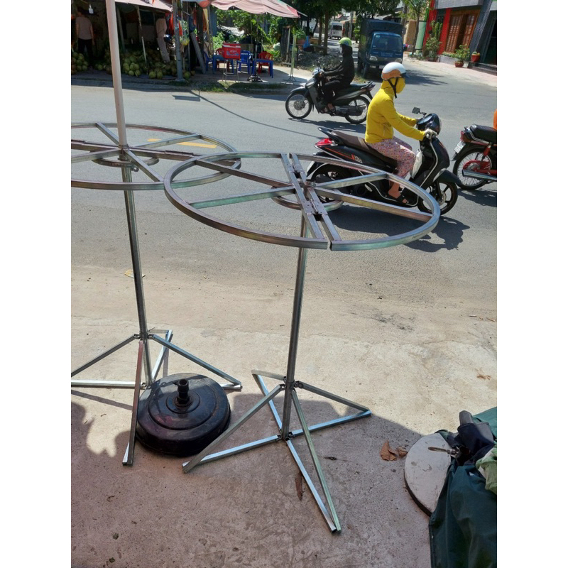 Rotating circle for hanging clothes and folding legs for sidewalk ...
