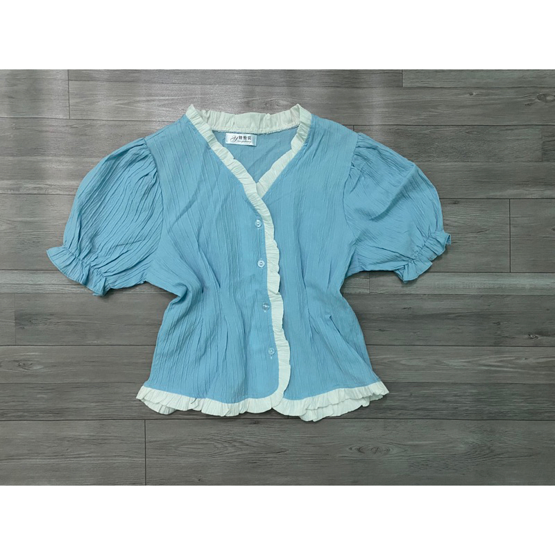 Blue ruffle shirt with slit waist (lighter color in photo) | Shopee ...