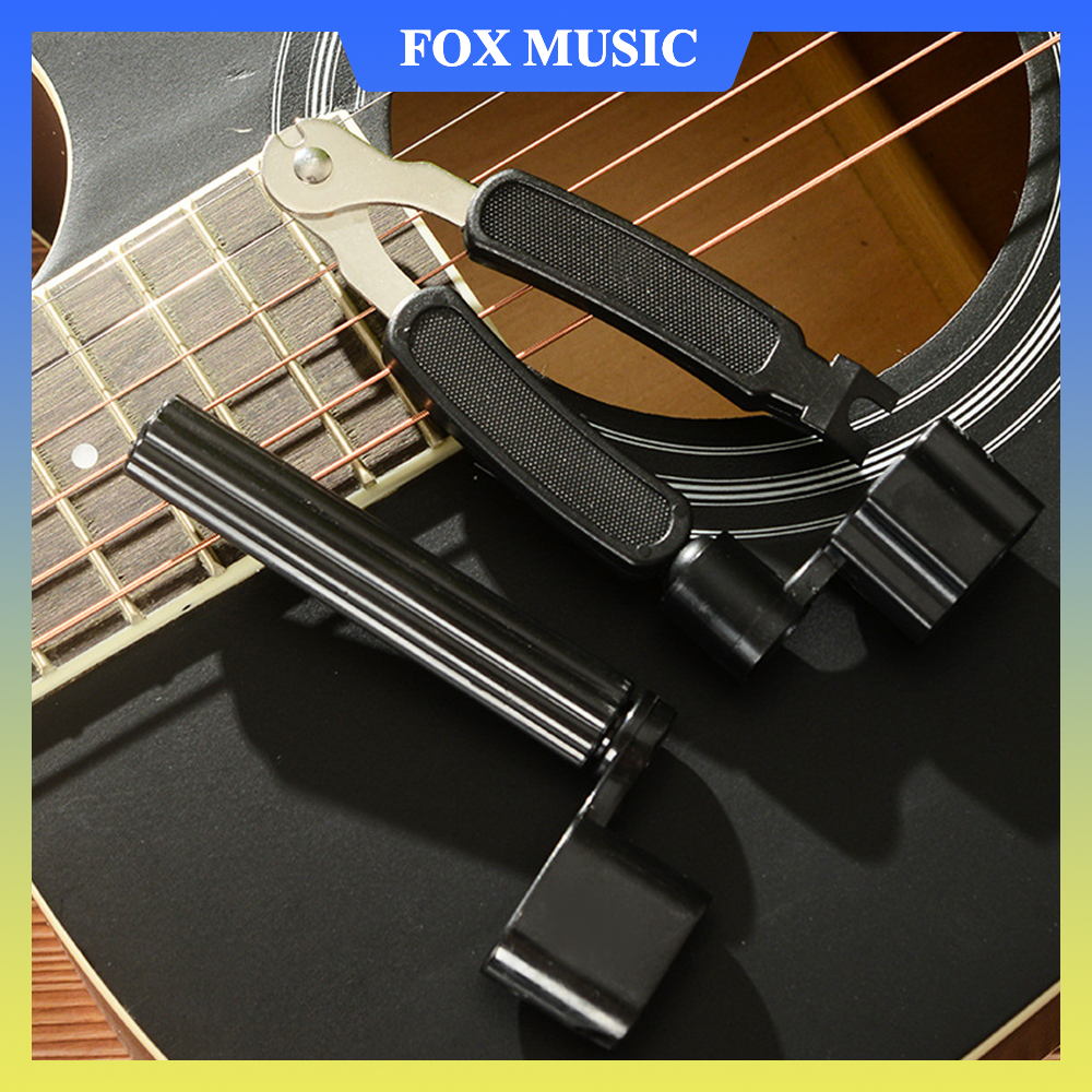 3-in-1 string changing tool (pin pusher, string crank, string cutter ...