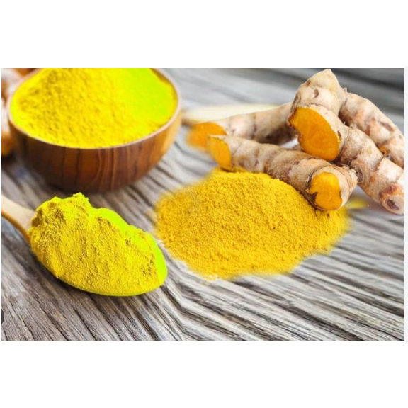 Delicious yellow turmeric powder (Curcumin powder) used for cooking ...
