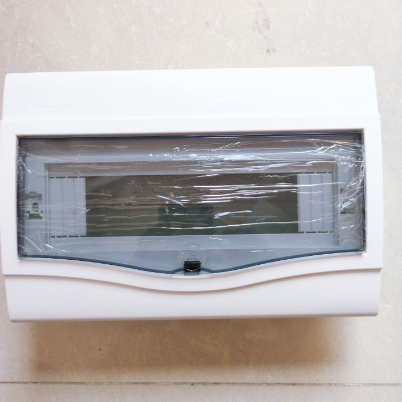 Wall-mounted electrical cabinet with plastic surface containing 9-12 ...