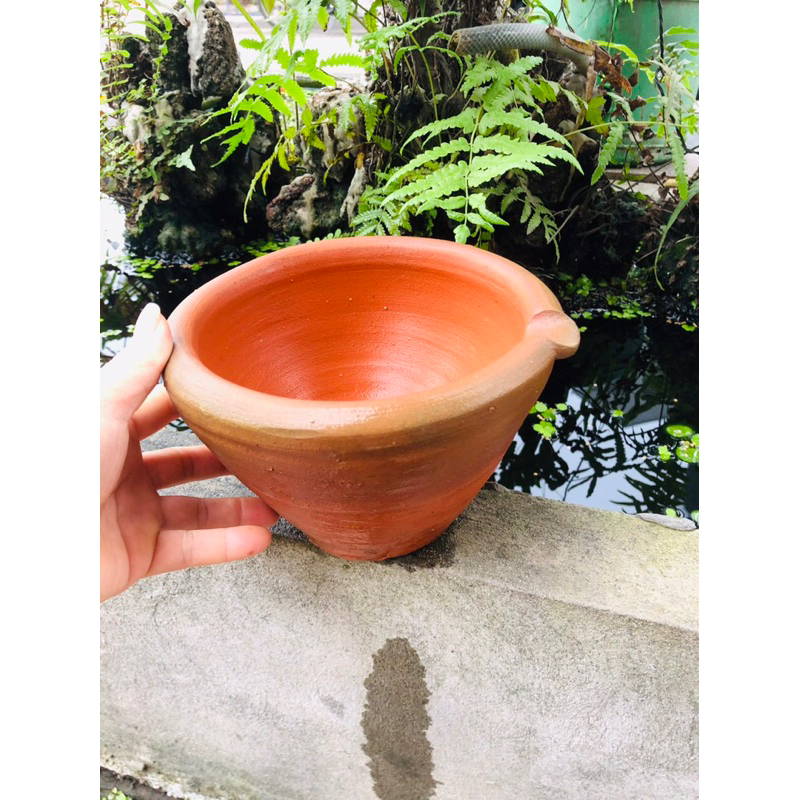 Terracotta mortar for crushing onions, garlic, and crabs (rich of ...