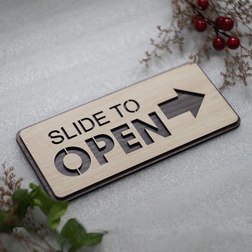 Slide to open plywood door panel with arrows indicating left and right ...