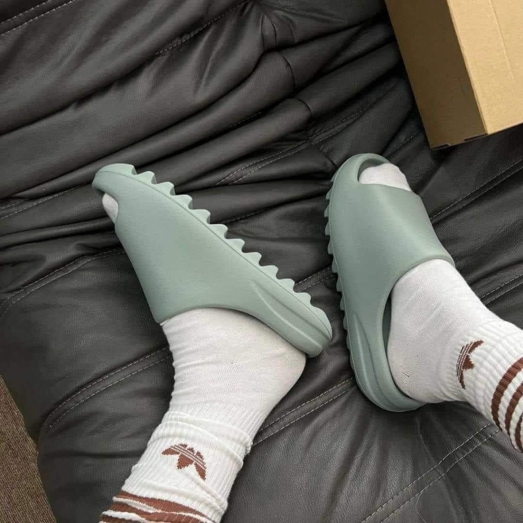 Yeezy slides in salt color with 3 basic colors, rough texture, high ...