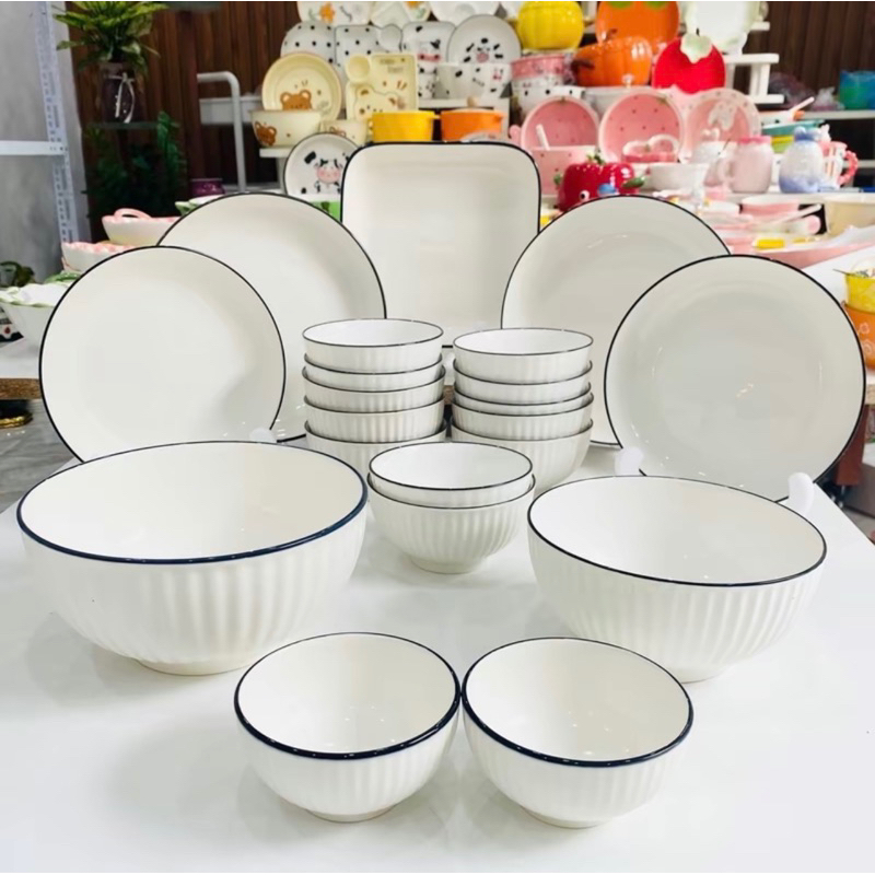 Luxury 21-piece dinnerware set with white pattern and black border ...