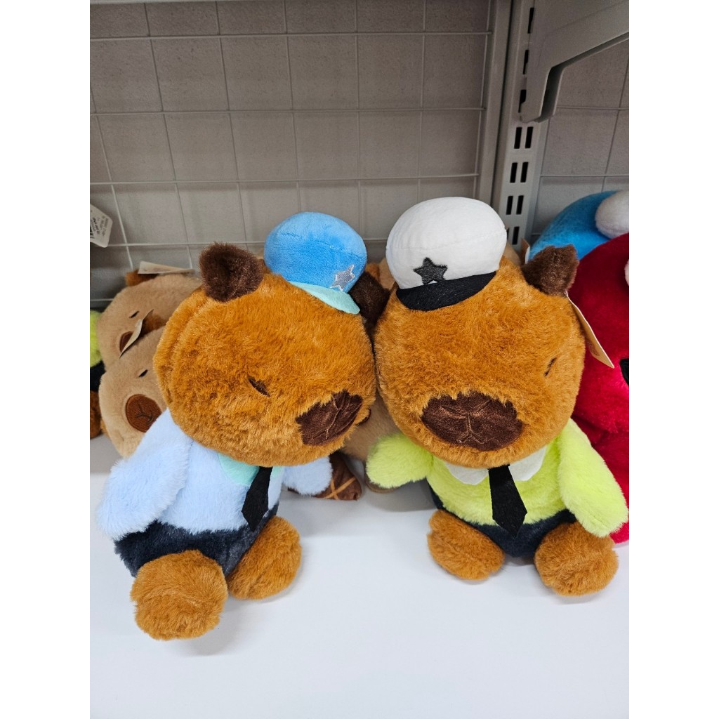 Cute police Capybara teddy bear hugs her arms | Shopee Philippines