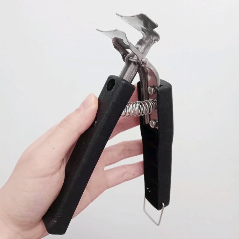 Hot tongs to pick up hot dishes, safe without burning hands for use in ...