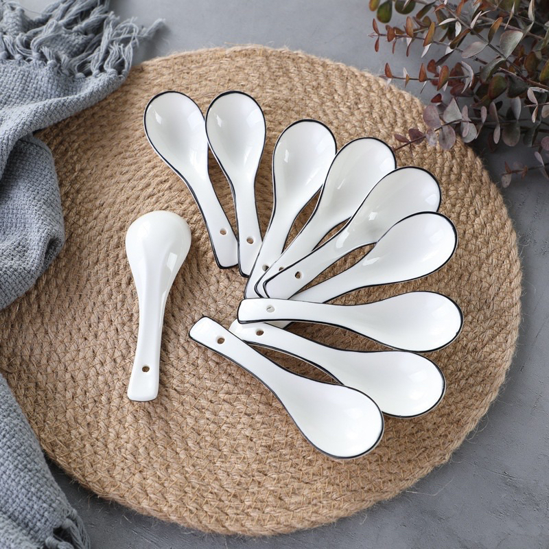 Compo of 3 white ceramic spoons with black rim, beautiful product with ...