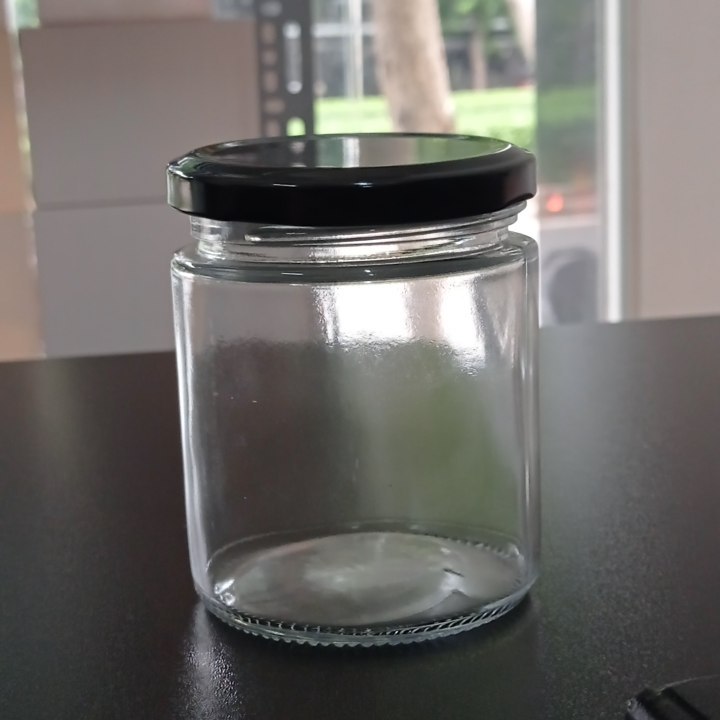 Zasavn 350ml round glass jar with thin tin lid used to store food and ...
