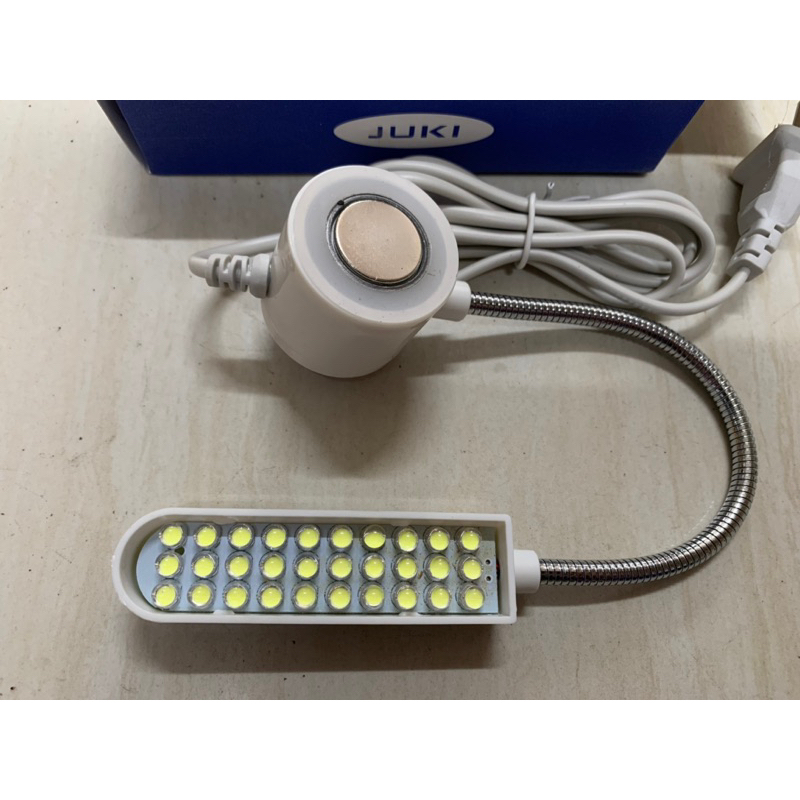 30-bulb led sewing machine light with lever attached to the sewing ...