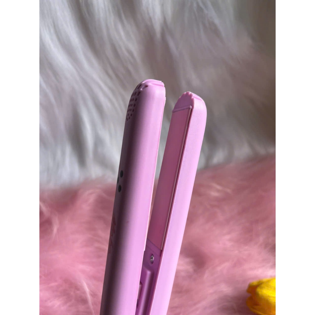 Compact and convenient MINI HAIR CLIP hair straightener that heats up ...