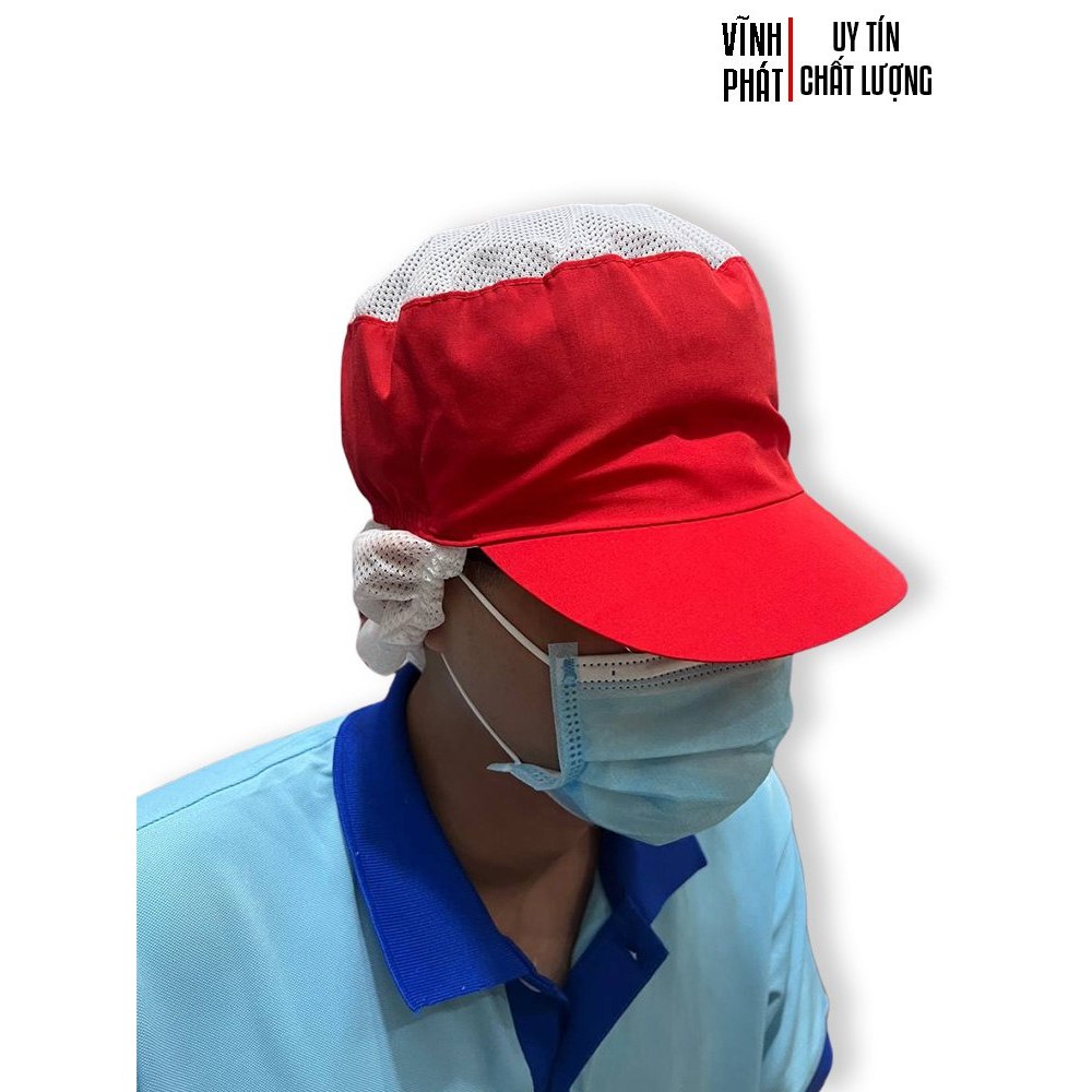 Long red mesh hat covers the hair of a worker to protect the closed ...