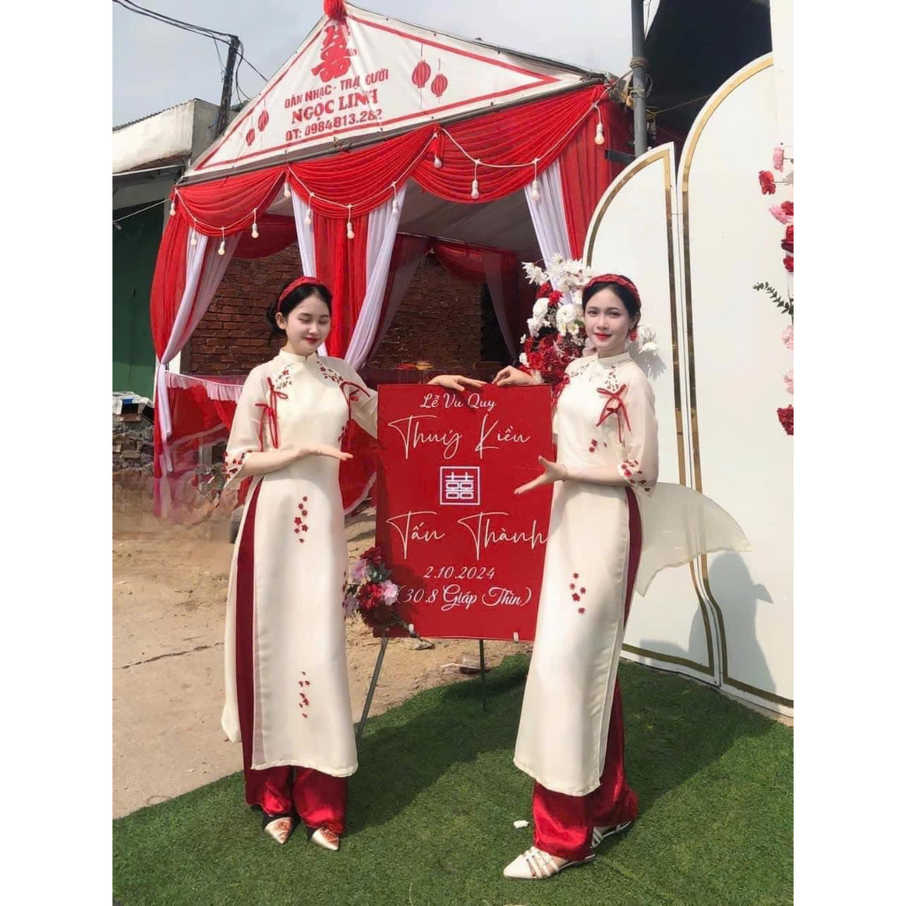 Modern Thanh Truc Ao Dai in cream color with elegant red flower ...
