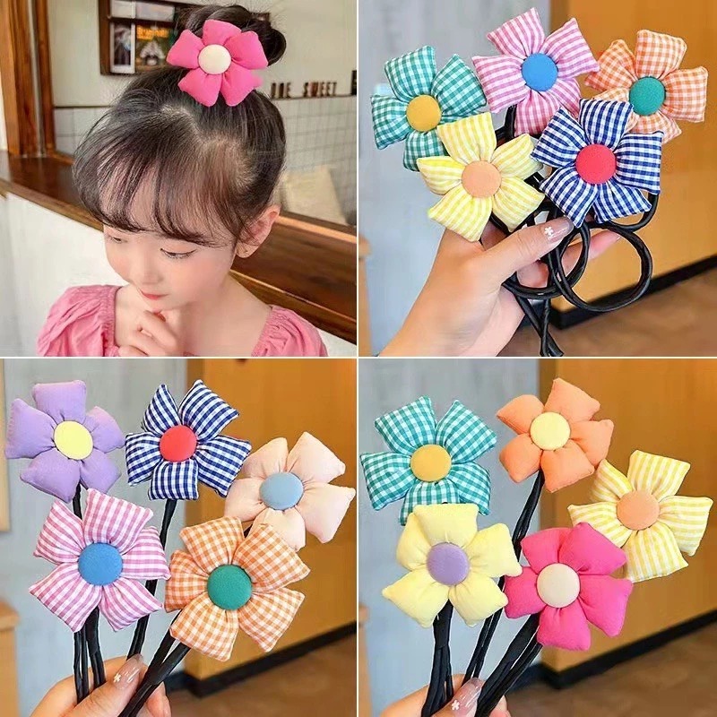 Cute flower-shaped hair bun for babies (random color) | Shopee Philippines