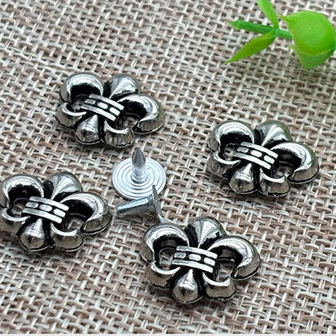 Chrome heart button with silver-plated anchor logo for measuring or ...