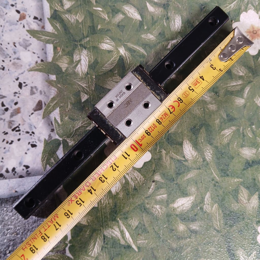 [note that falling balls] version of 12 small square sliding rails ...