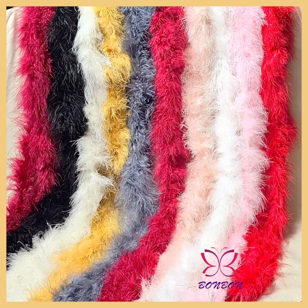 Multi-colored fluff string accessories used to attach costumes and ...