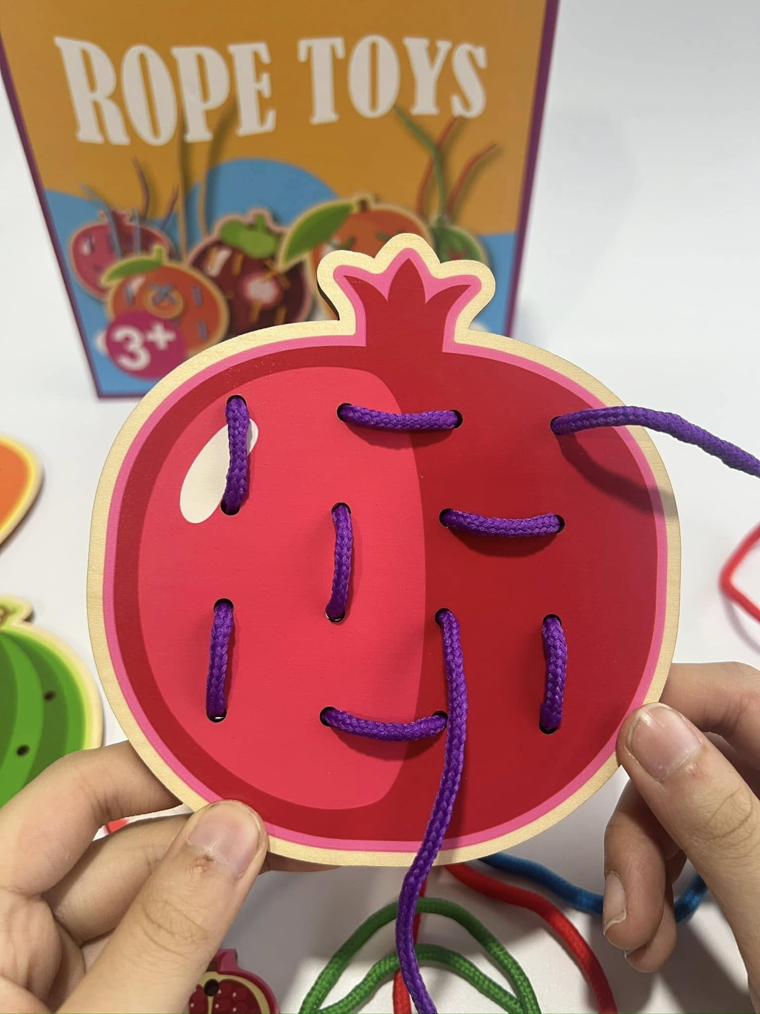 Wooden fruit-shaped string montessori toy set helps children develop ...