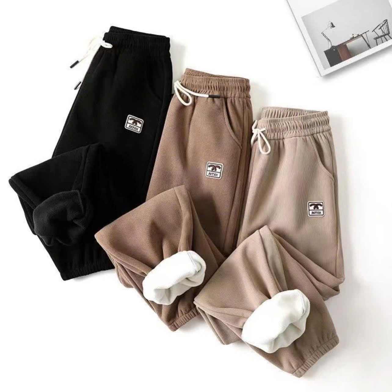 Women's fleece-lined jogger pants with hem, outstanding thigh logo ...
